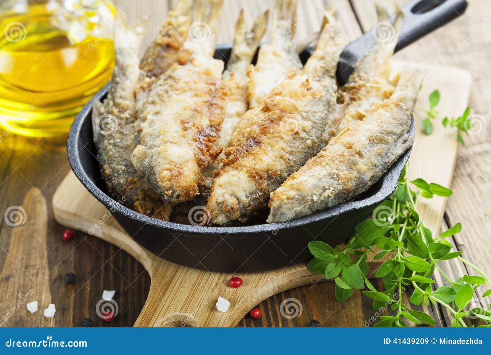Fried fish in a frying pan stock image. Image of healthy - 41439209