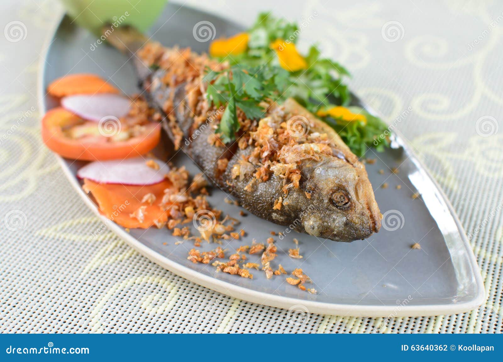 Fried fish with garlic stock photo. Image of white, healthy - 63640362