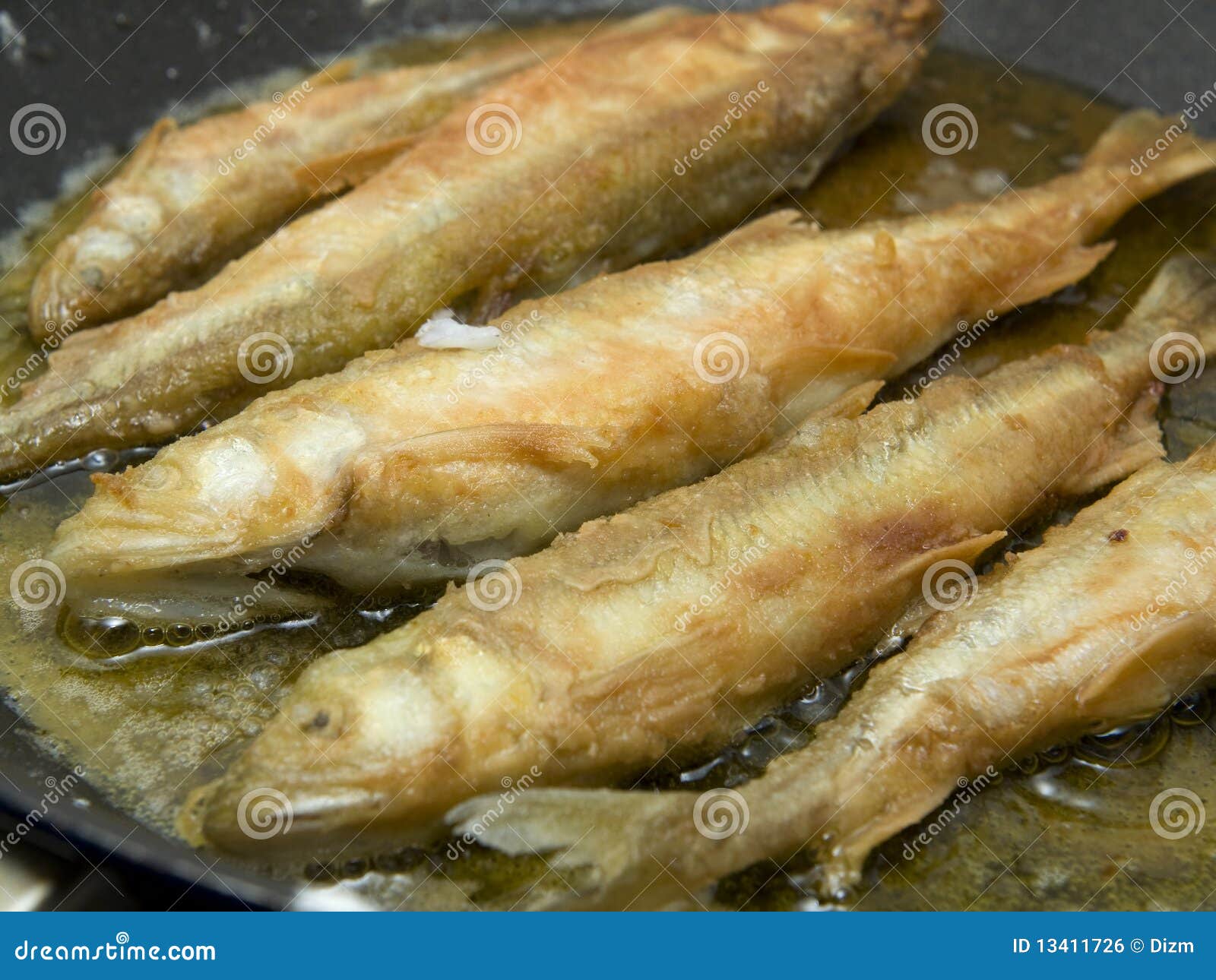 Fried Fish in a Hot Pan stock photo. Image of meal, eating - 13411726