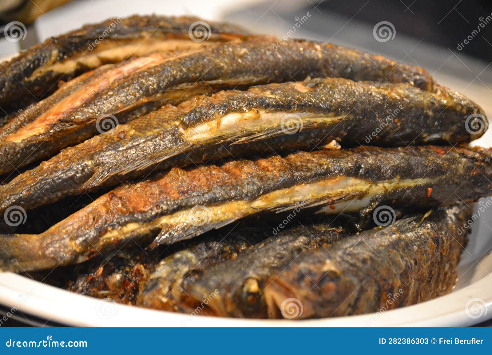 Fried Fish Lined Up with Heads, Trout Fish Stock Image - Image of tasty ...
