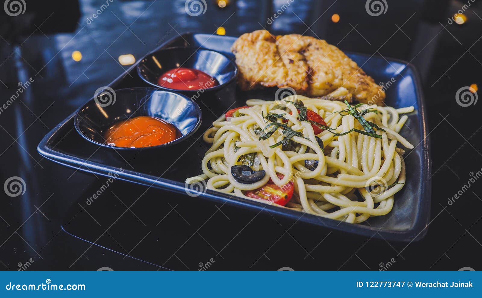 Spaghetti with Fried Fish stock image. Image of delicious - 122773747