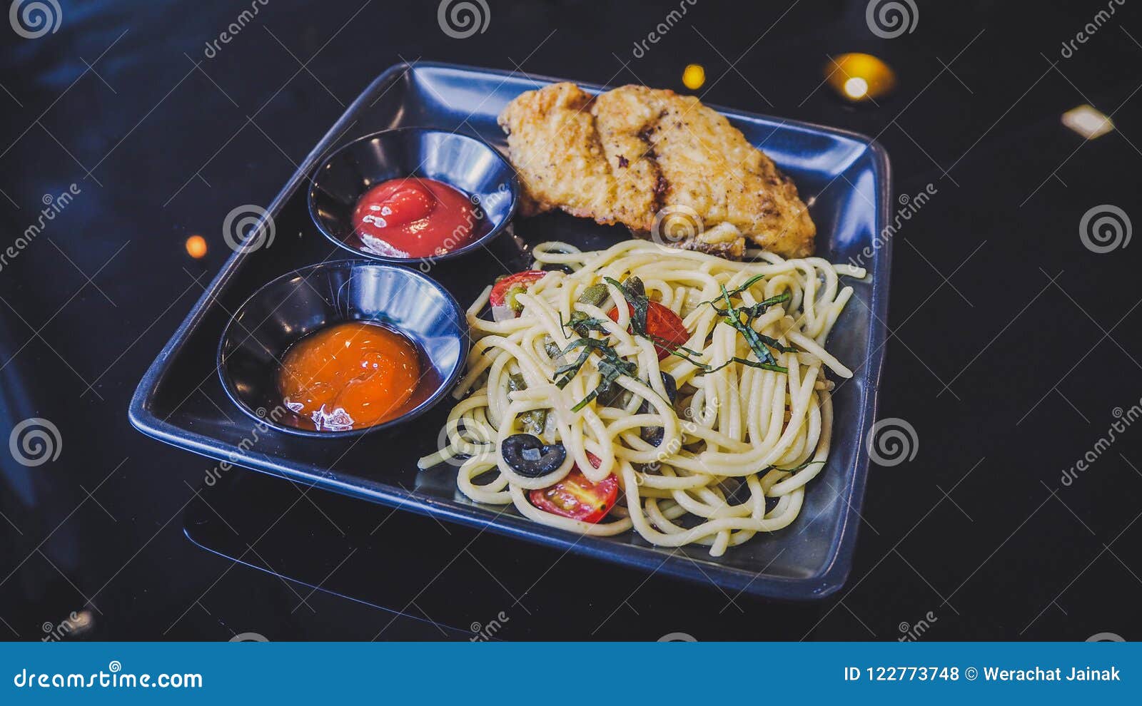 Spaghetti with Fried Fish stock photo. Image of delicious - 122773748
