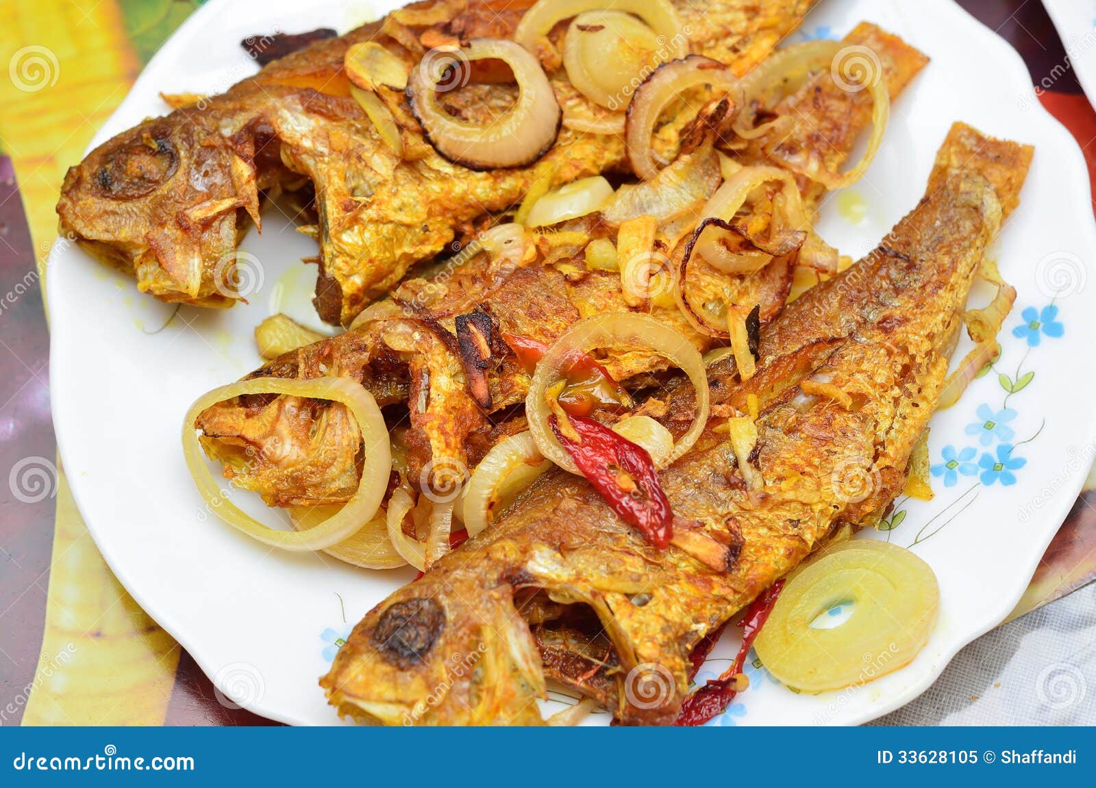Fried fish with onions stock image. Image of food, organic - 33628105