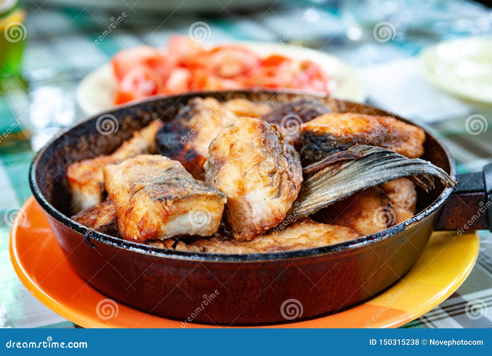 Fried Fish in a Pan on the Table Stock Photo - Image of iron, closeup ...