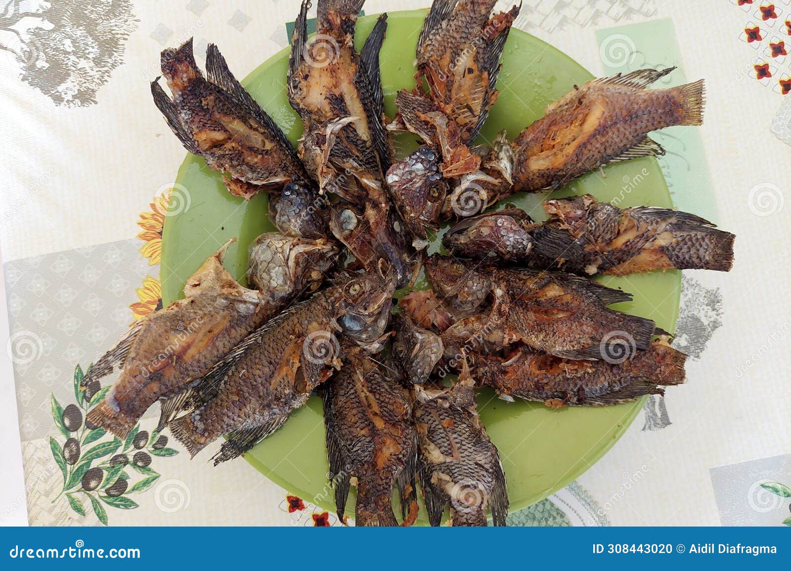 Fried Fish on a Plate at the Dining Table Stock Photo - Image of diet ...
