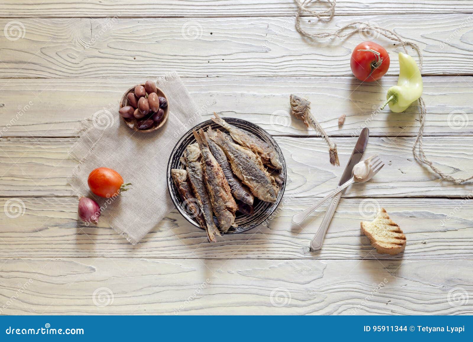 Fried fish on a plate stock photo. Image of composition - 95911344