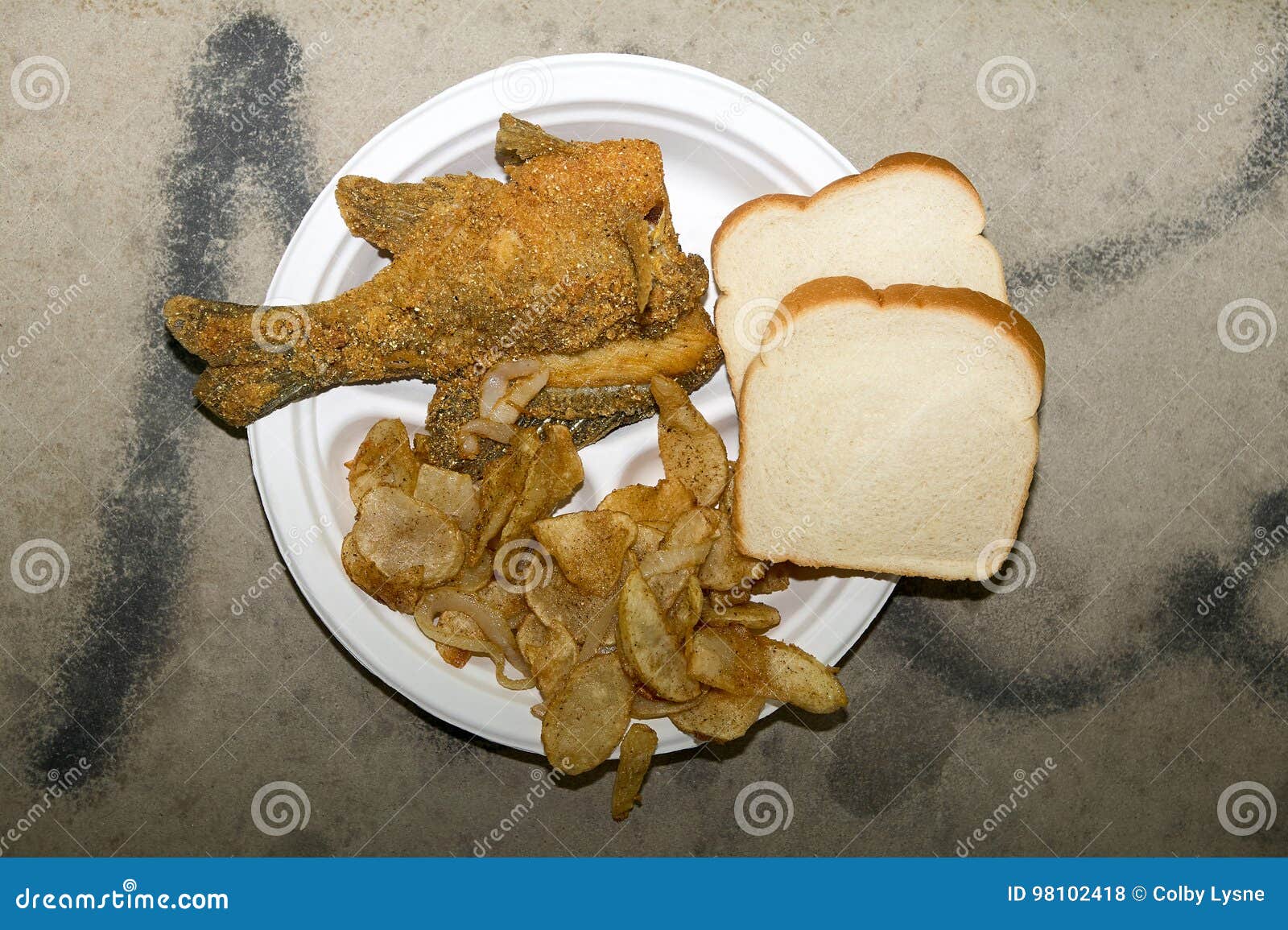 Fried Fish with Potatoes and Bread on Plate Stock Photo - Image of ...