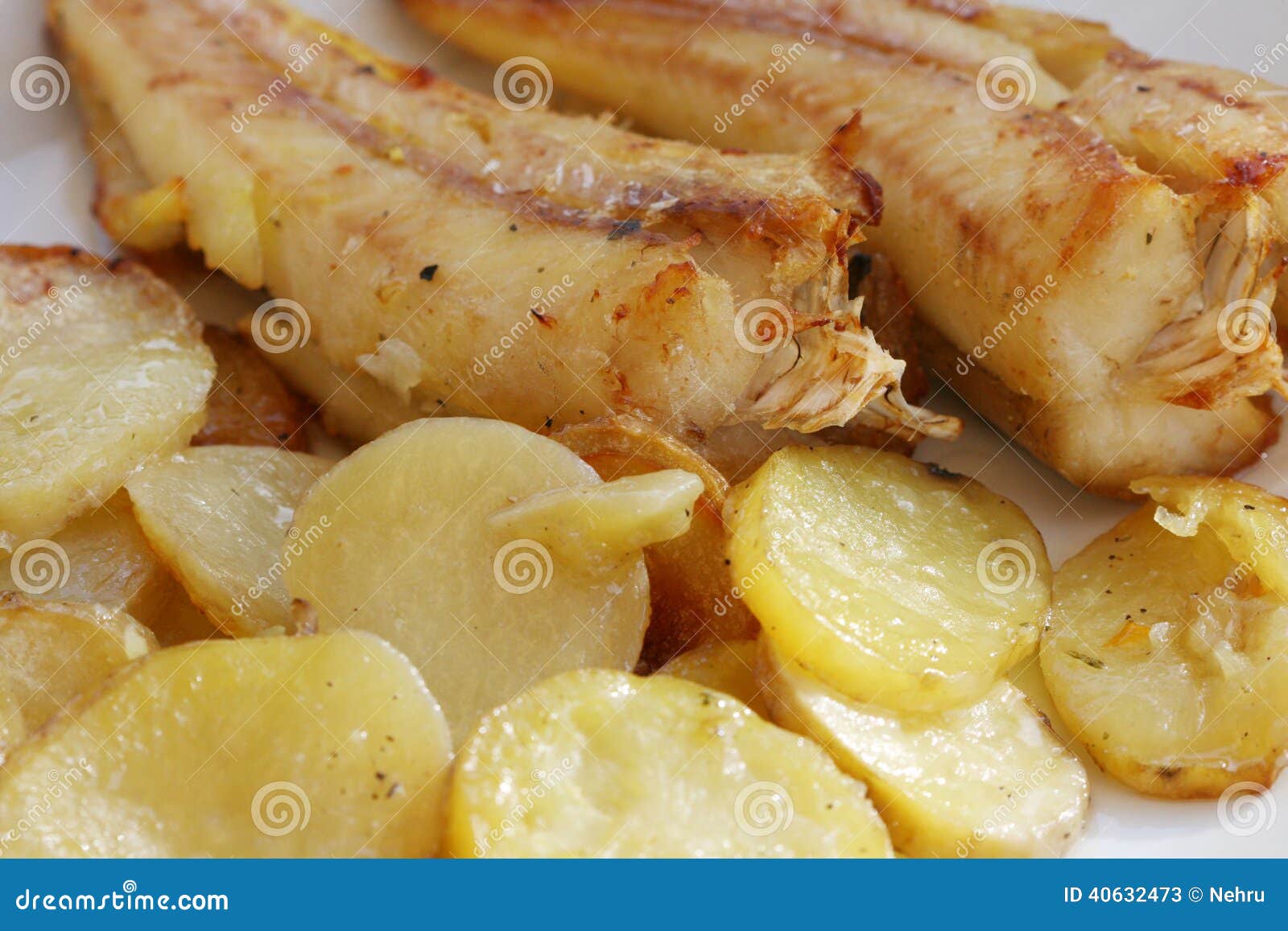 Fried fish and potatoes stock image. Image of cucumber - 40632473