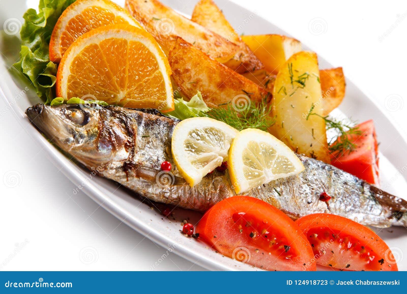 Fried fish with potatoes stock image. Image of lettuce - 124918723