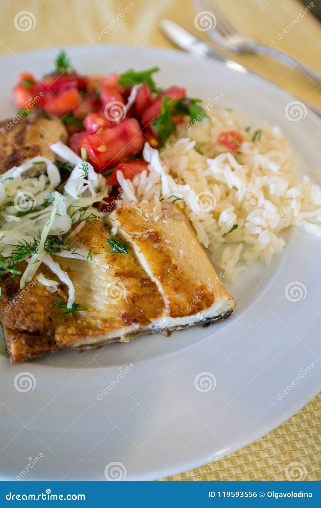 Fried Fish with Rice Cabbage and Tomatoes on Plate Stock Photo - Image ...