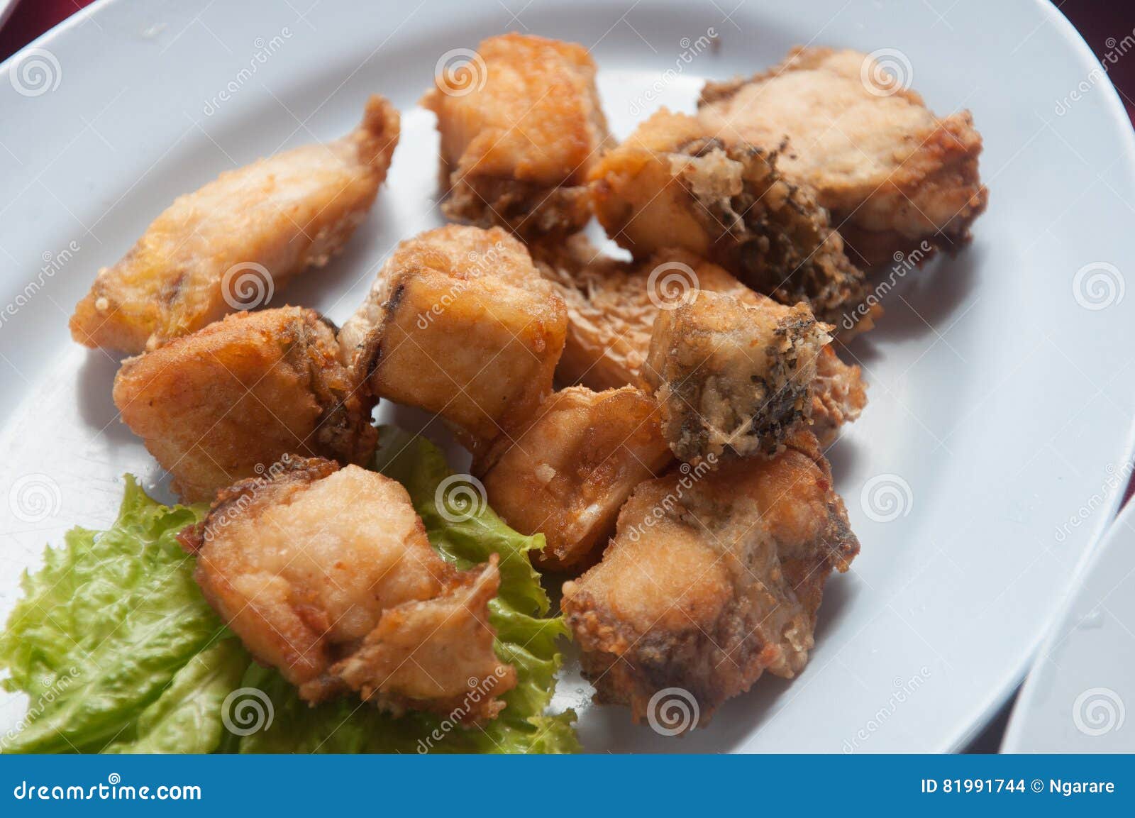 Fried Fish slice on dish stock photo. Image of fried - 81991744