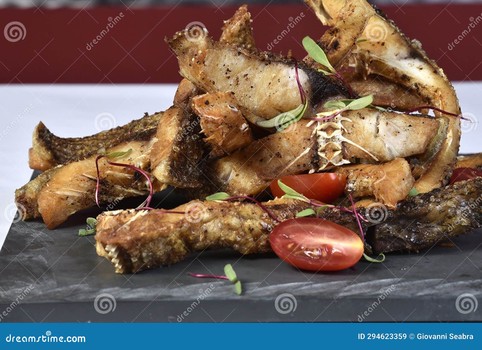 Fried Fish Strips Served on Stone Stock Image - Image of fish, fork ...
