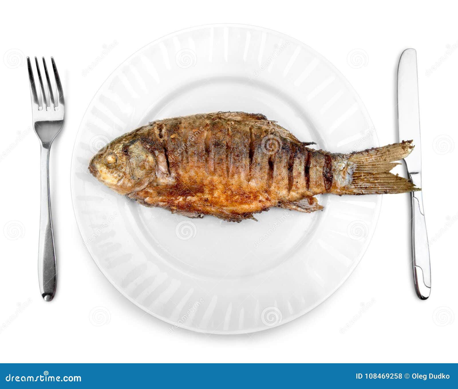 Fried Fish on White Plate with Fork and Knife Stock Photo - Image of ...