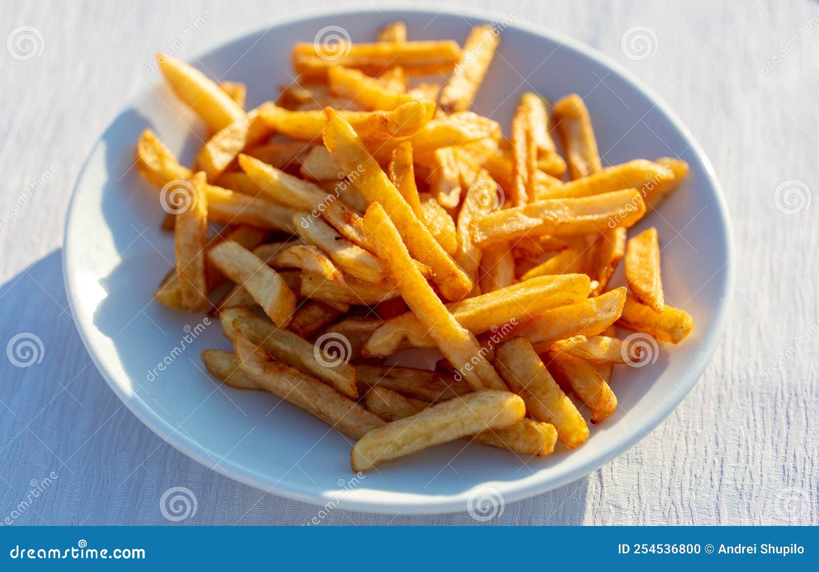 Fried French Fries on a White Plate Stock Photo - Image of plate, sauce ...