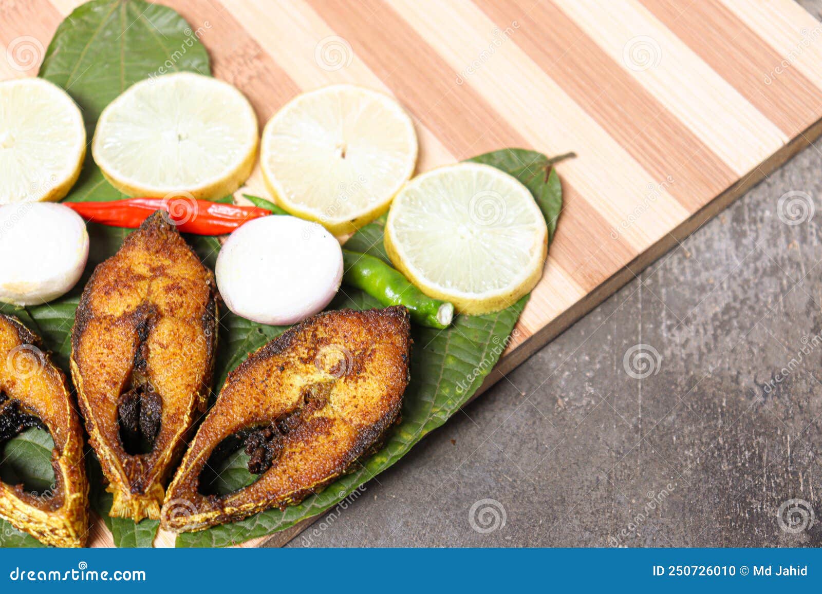 Fried Hilsa Fish on Kitchen Stock Photo - Image of white, green: 250726010