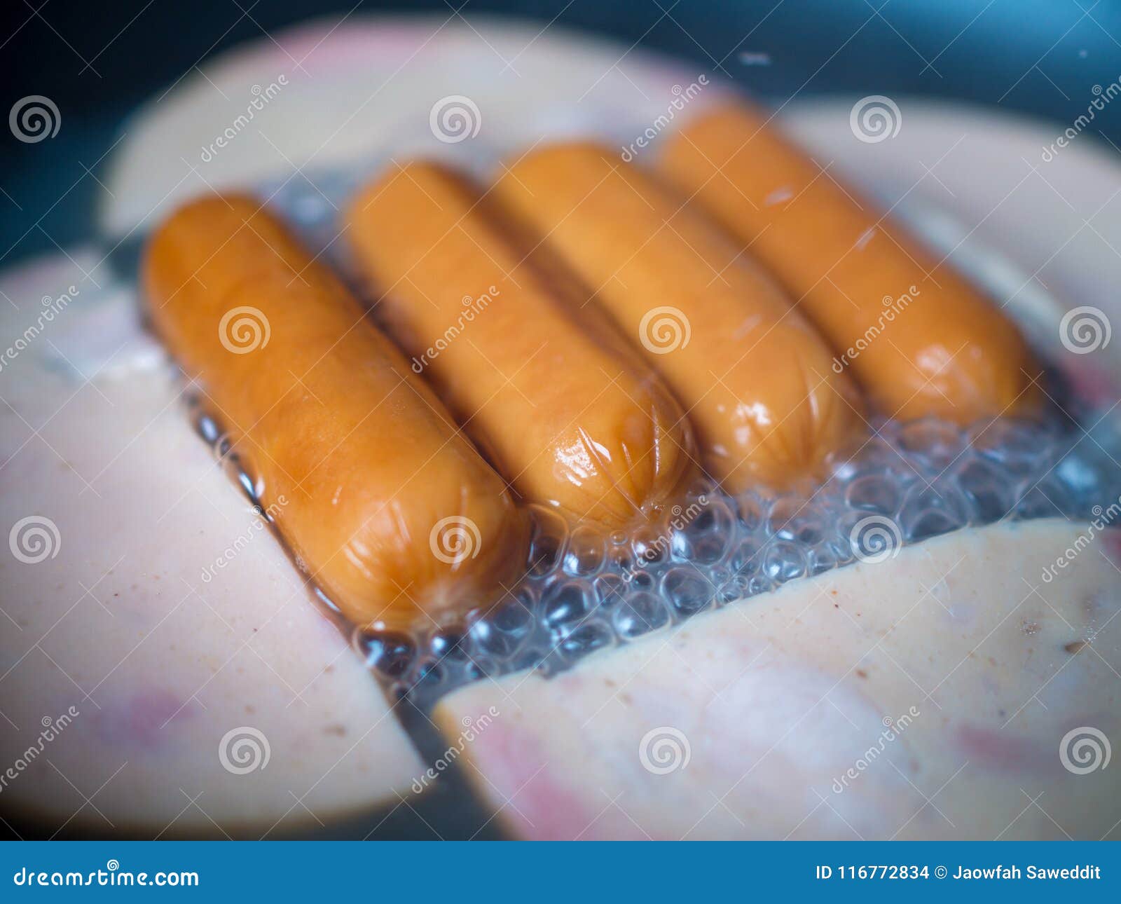 Fried hot dog ham on pan stock photo. Image of dish - 116772834