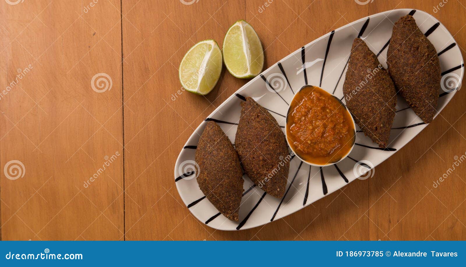 Fried Kibbeh Served with Pepper Sauce, on a White Plate Stock Image ...