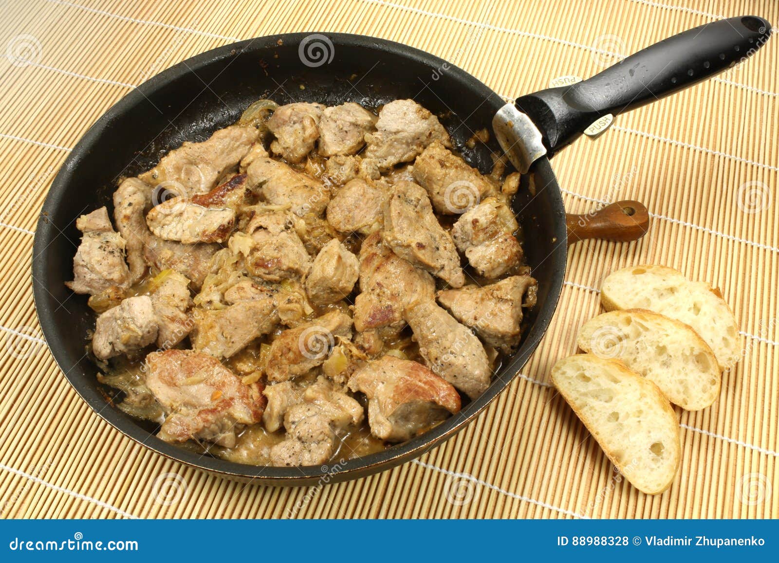 Fried meat on a frying pan stock photo. Image of garnish - 88988328
