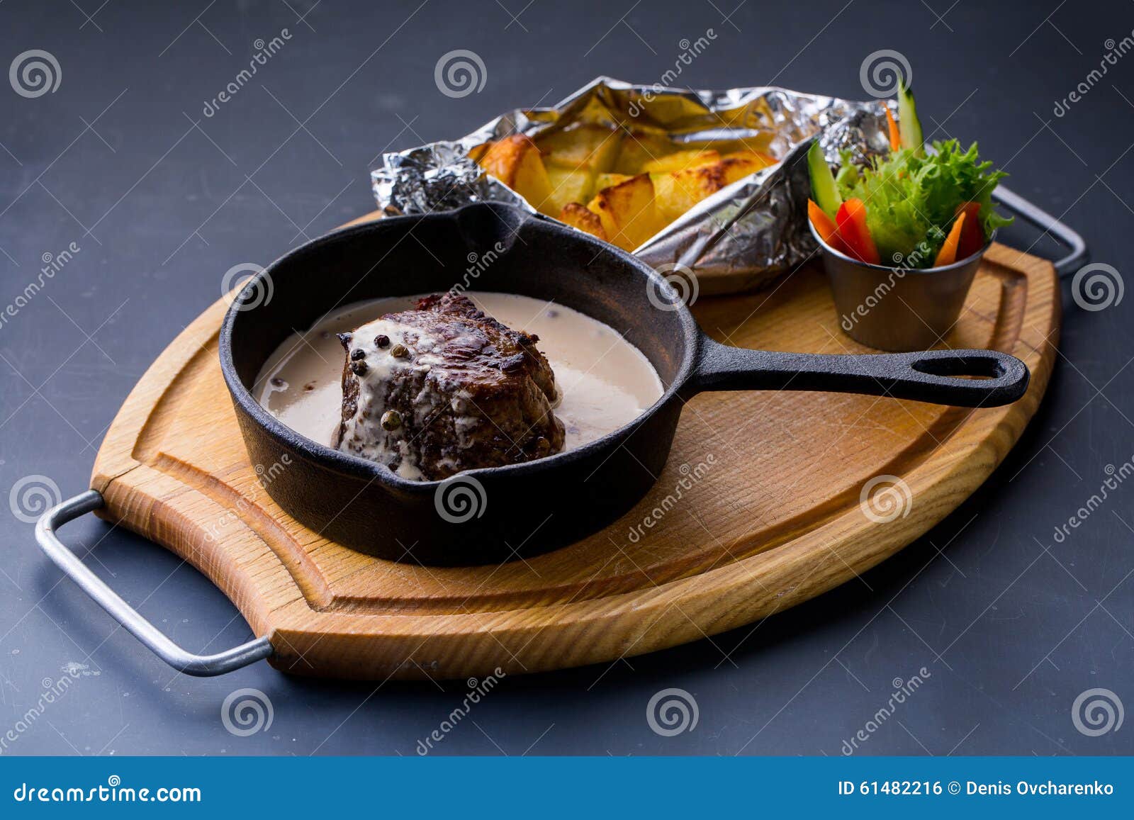 Fried Meat in a Pan in a Creamy Sauce on Dark Table Stock Photo - Image ...