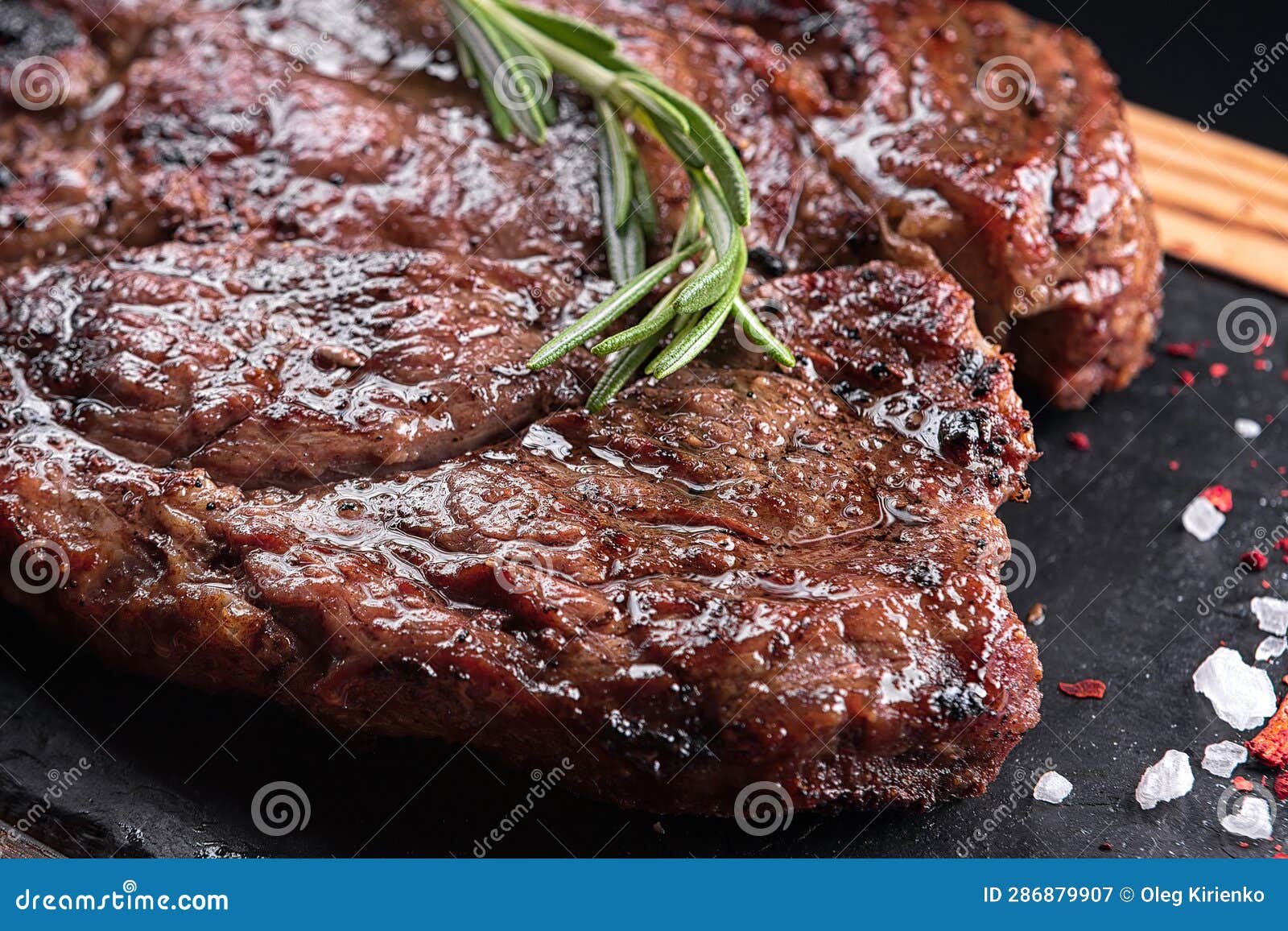 Fried Meat Steak on Slate on a Black Background Stock Image - Image of ...