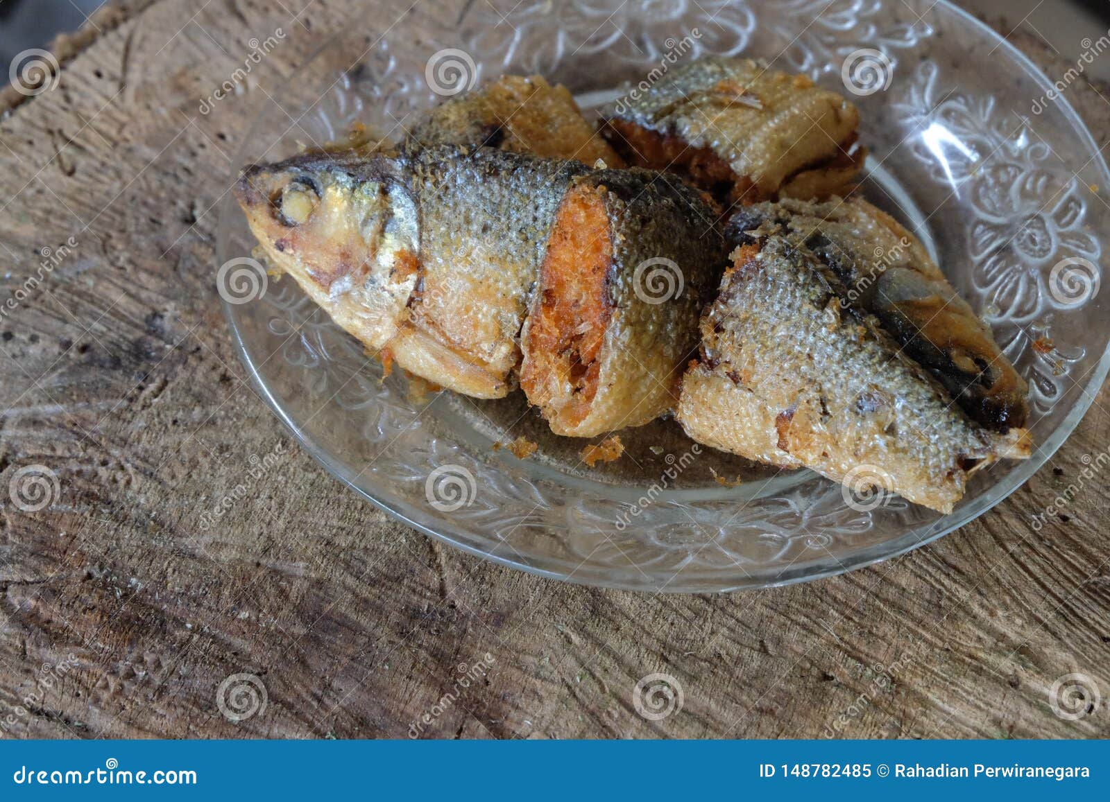 Fried Milkfish on a Plate on Wooden Table Stock Image - Image of fish ...