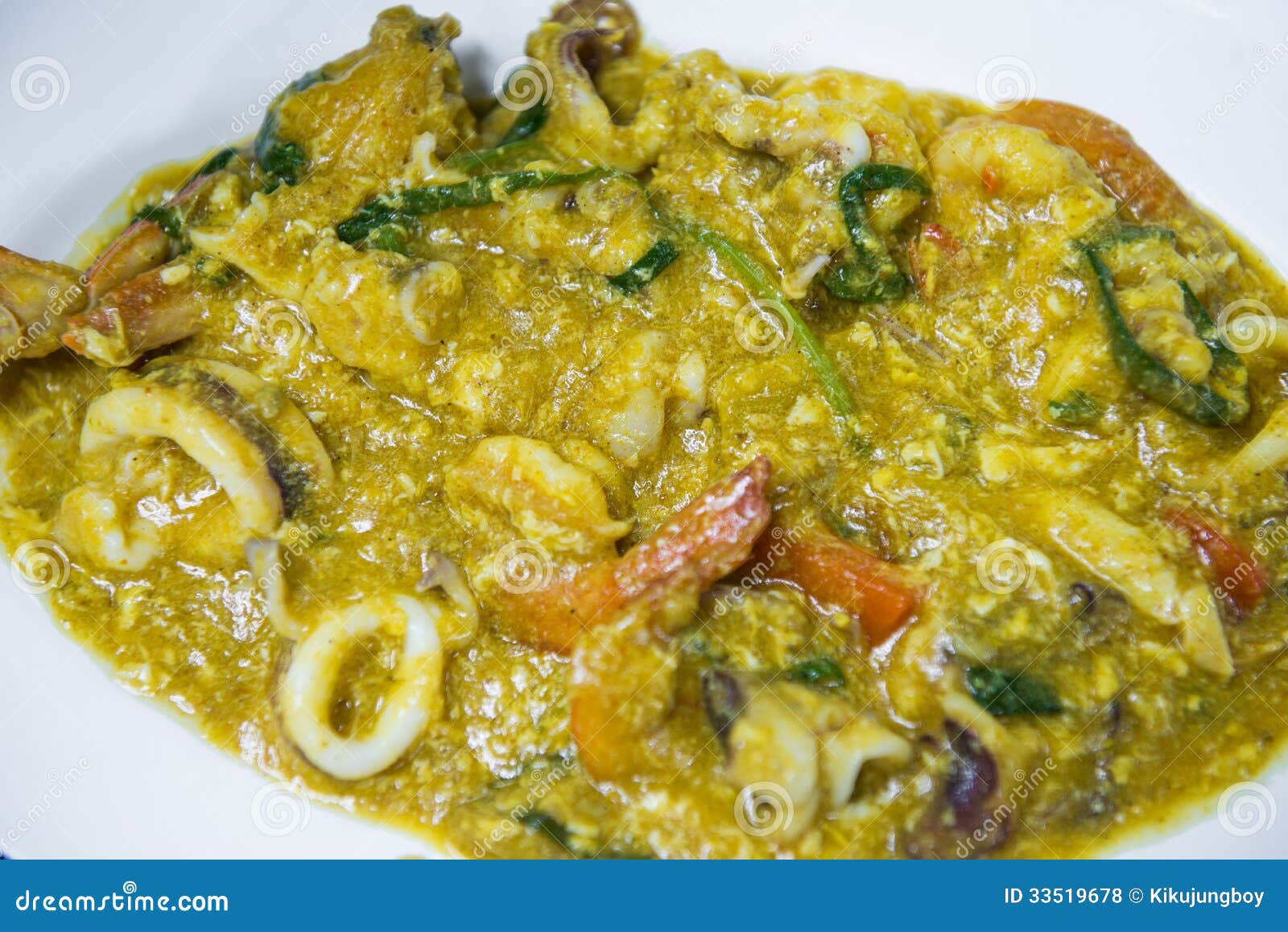 Fried Mixed Seafood with Yellow Curry Stock Photo - Image of squid ...