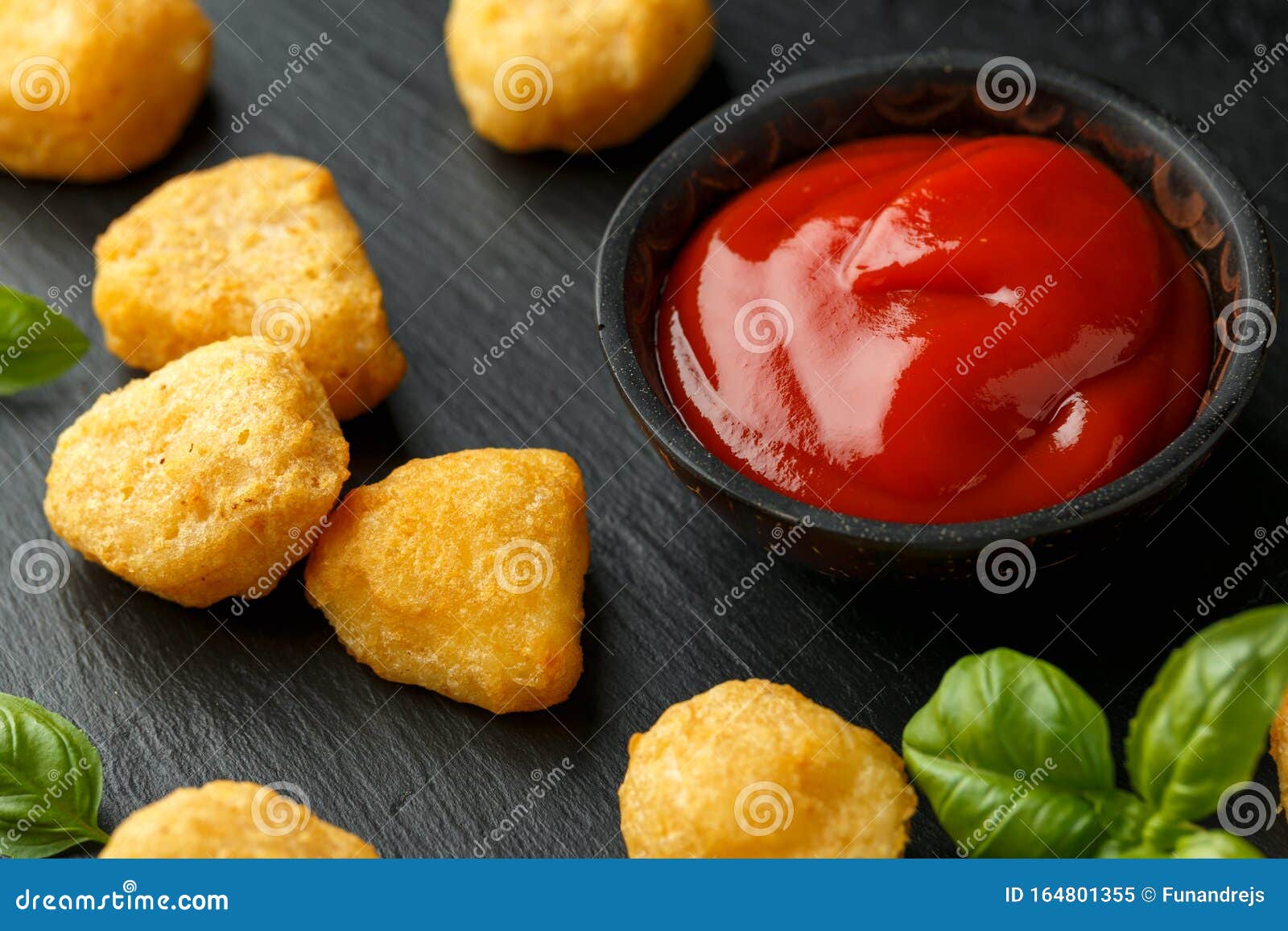 Fried Mozzarella, Cheddar Cheese Bites, Balls with Ketchup on Rustic ... Fried Mozzarella, Cheddar Cheese Bites, Balls with Ketchup on Rustic ...