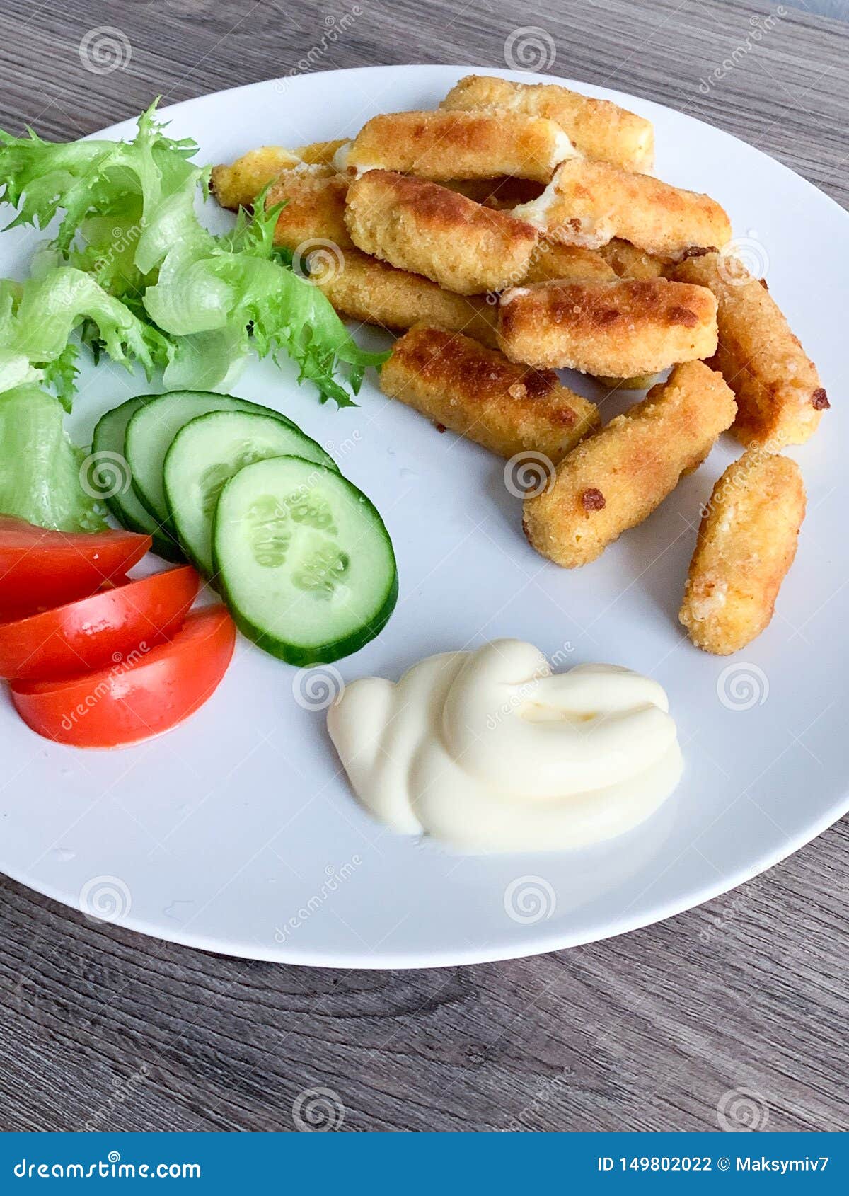 Fried Mozzarella Cheese Sticks Breaded on White Plate Stock Photo ...