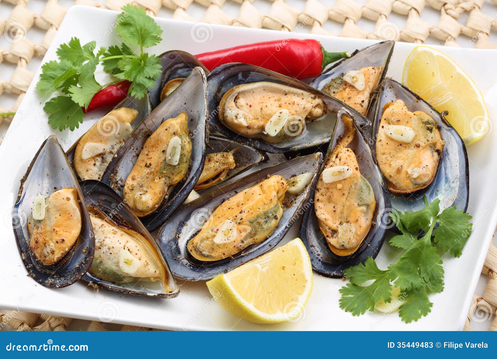 Fried Mussels with Pepper and Garlic Stock Image - Image of lemon ...