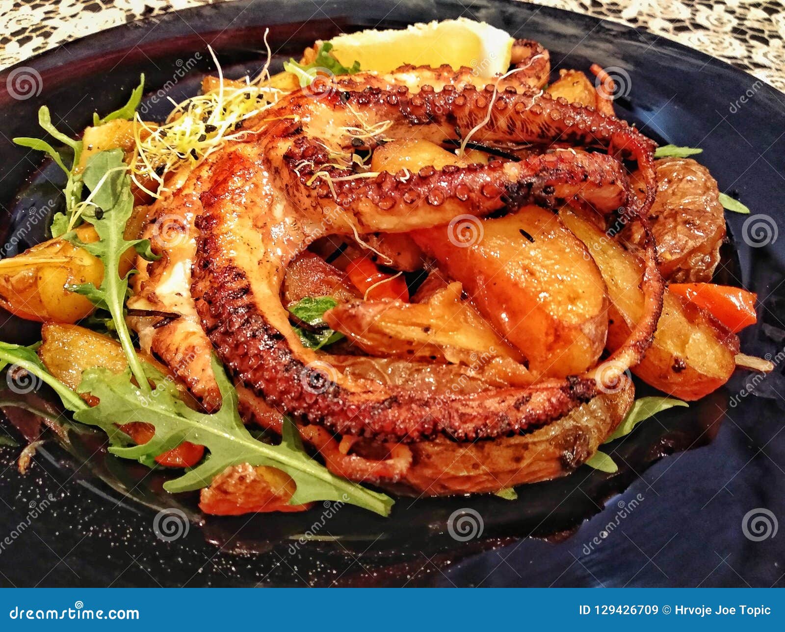 Octopus stock image. Image of potatoes, octopus, delicious - 129426709