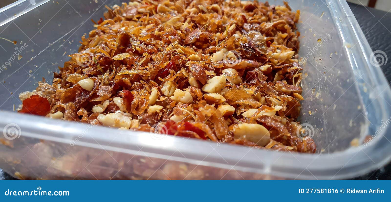 Fried Onions in a Plastic Container Stock Photo - Image of closeup ...