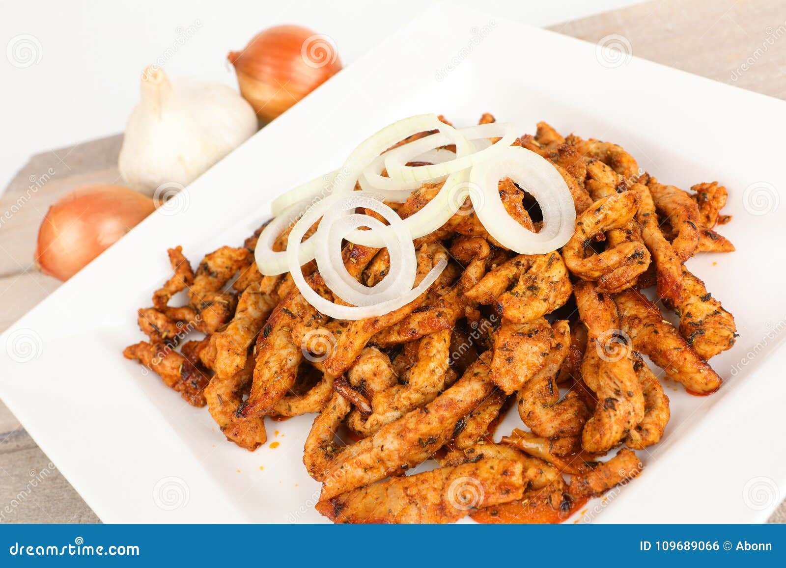 Pan gyros on a plate stock photo. Image of marinated - 109689066