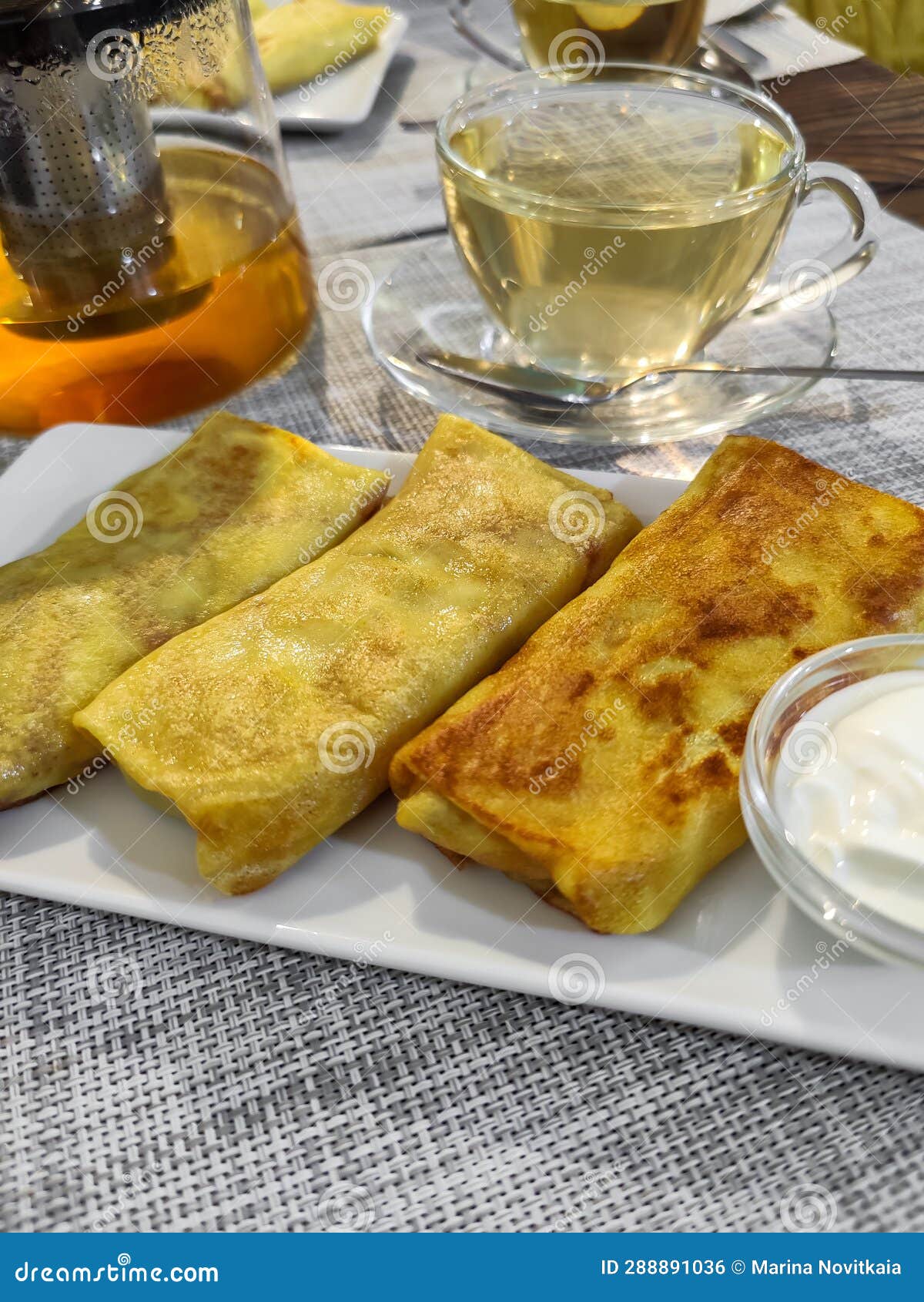 Fried Pancakes Stuffed with Meat and Sour Cream. Placed on a ...