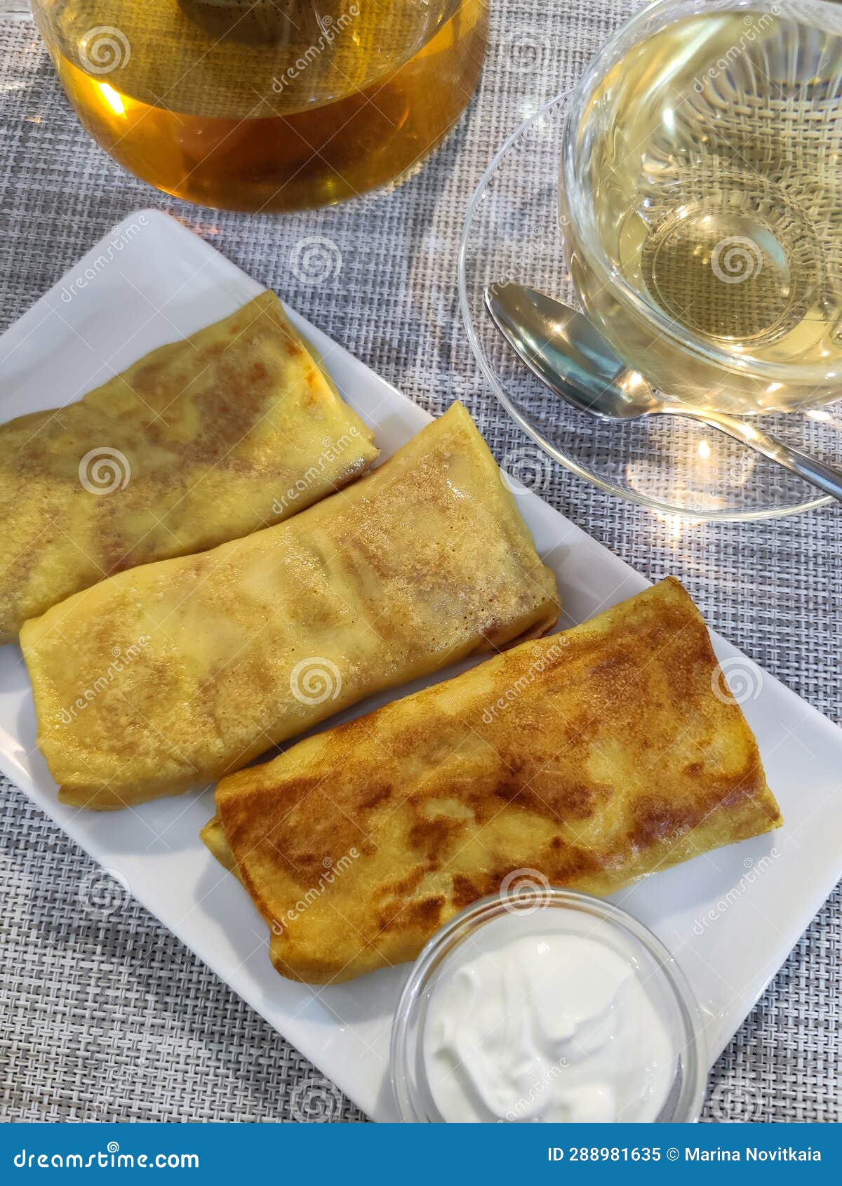 Fried Pancakes Stuffed with Meat and Sour Cream. Placed on a ...