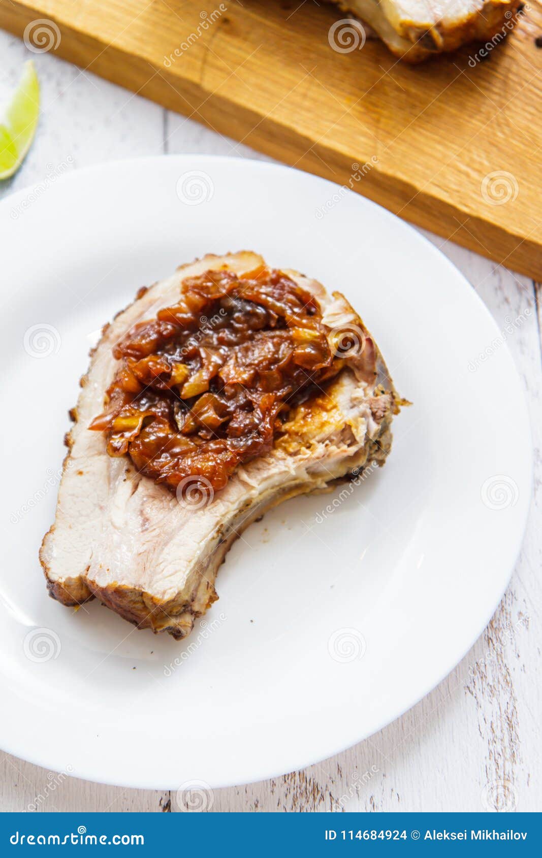 Fried Piece of Pork on a White Ceramic Plate Stock Photo - Image of ...