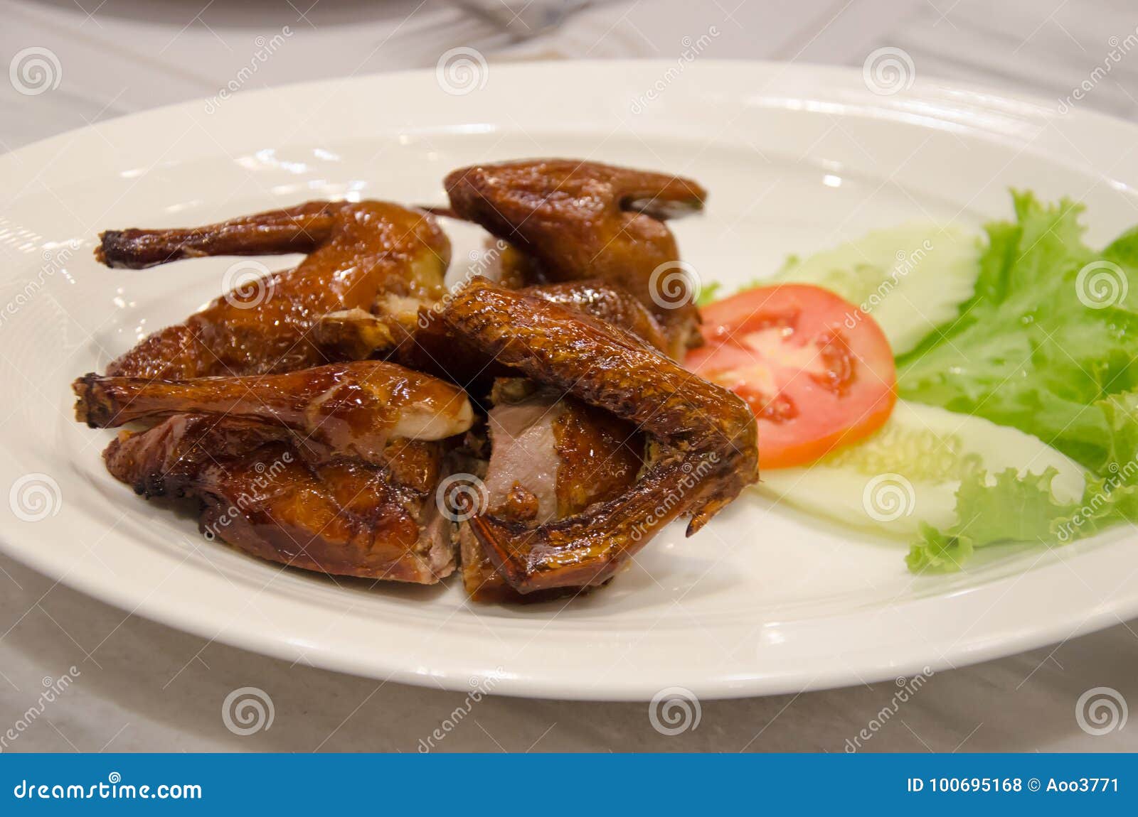 Fried pigeon stock photo. Image of tasty, garnish, white - 100695168