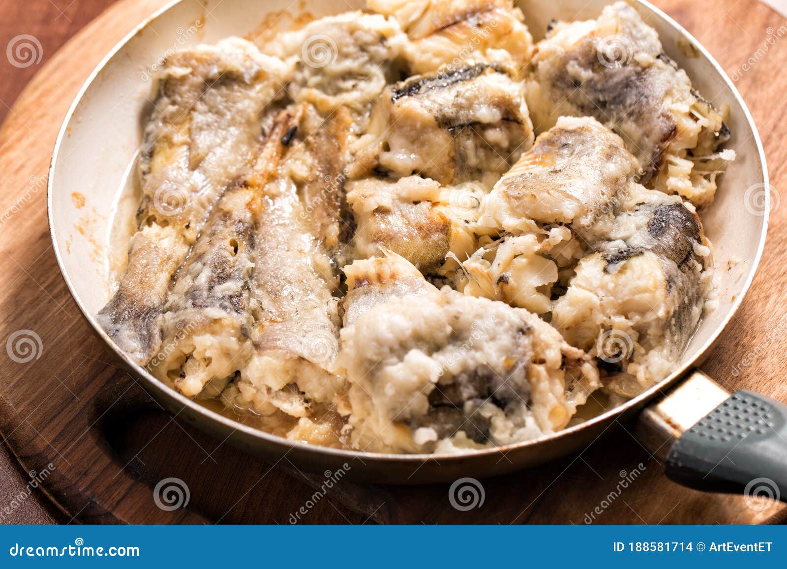 Fried pollock in pan stock photo. Image of barbecue - 188581714