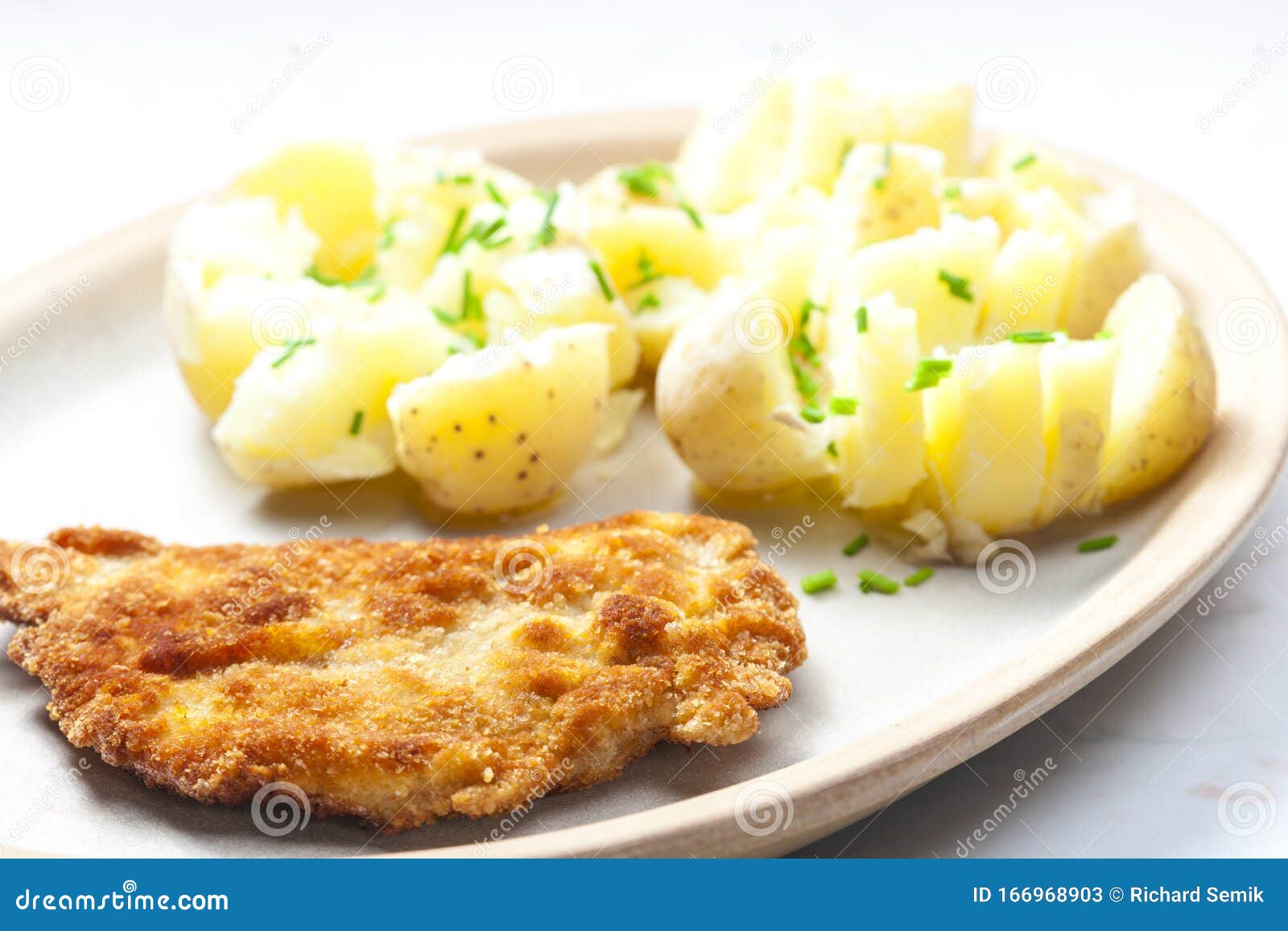 Fried Pork Fillet with Boiled Unpeeled Potatoes Stock Image - Image of ...