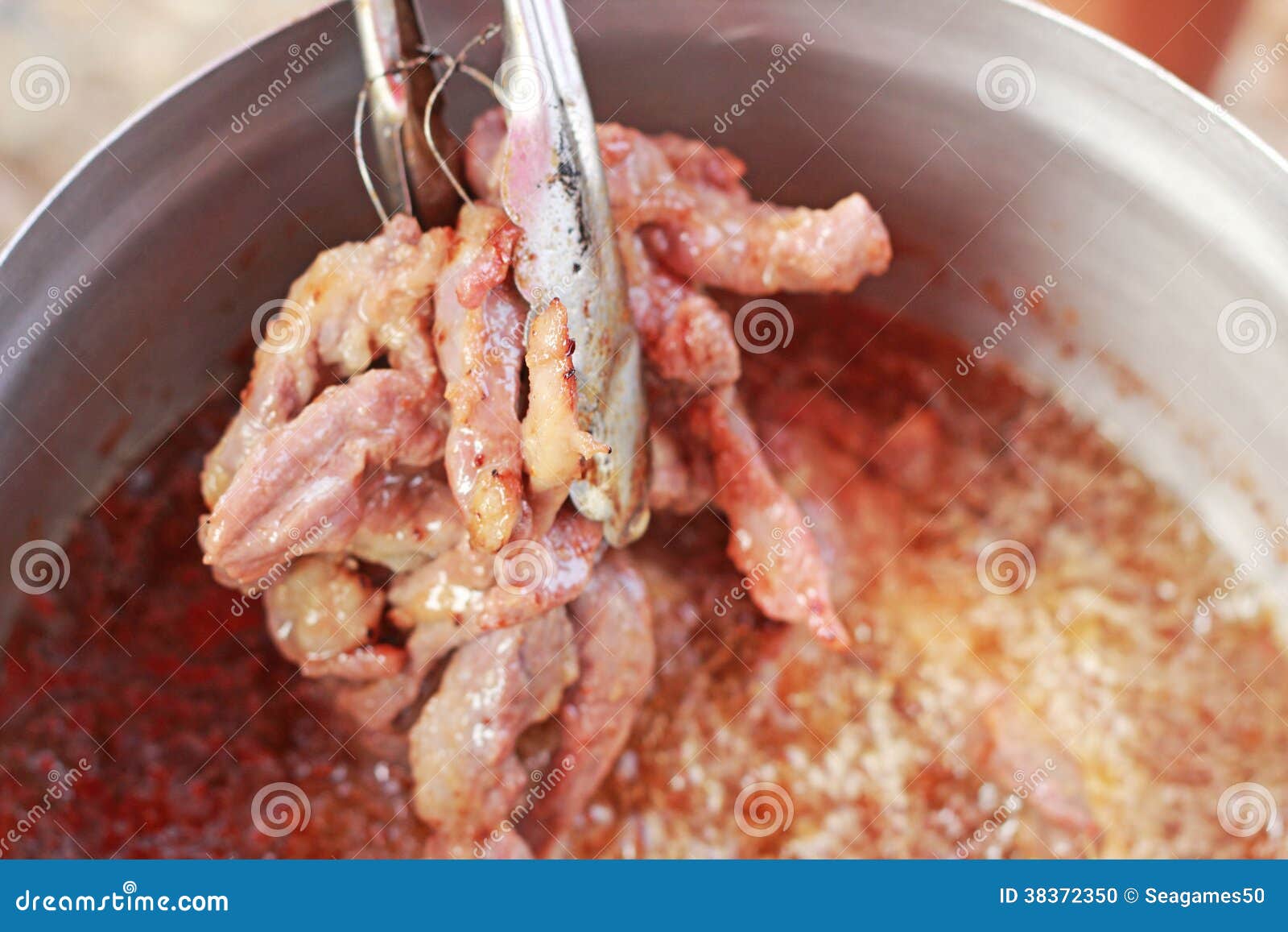 Fried pork in a pot stock photo. Image of asia, brown - 38372350