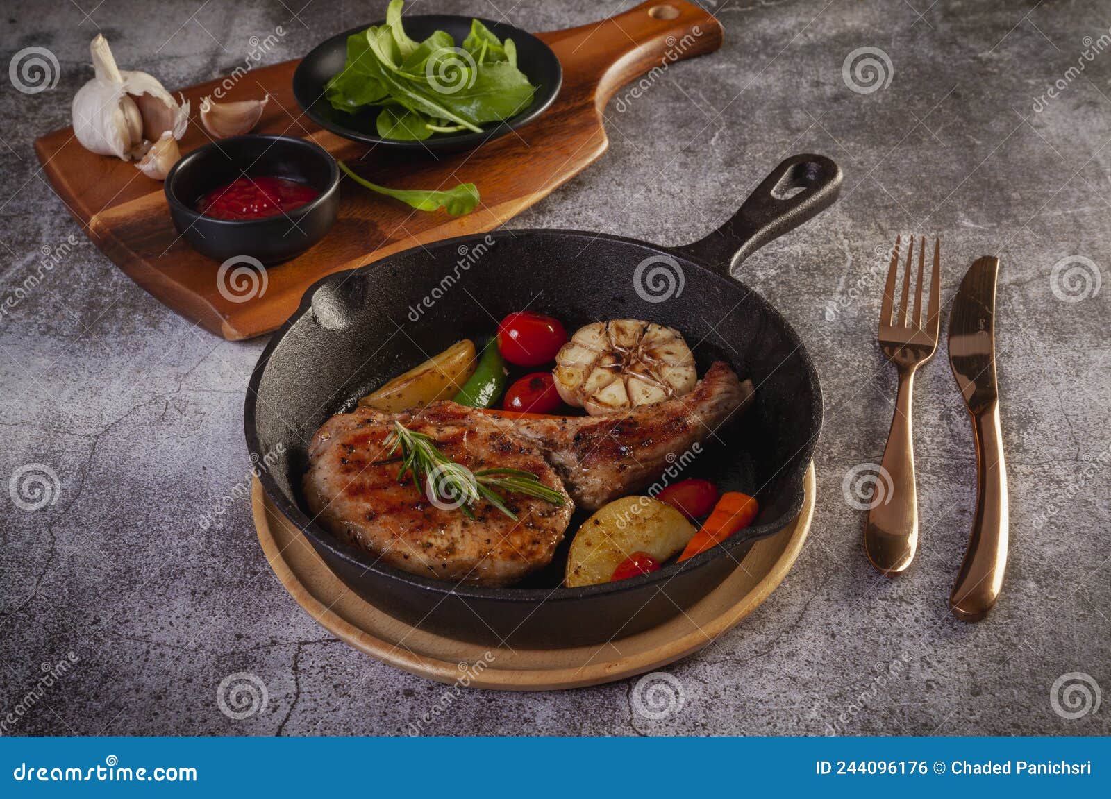 Fried Pork Steak in Frying Pan, Close Up View Stock Photo - Image of ...