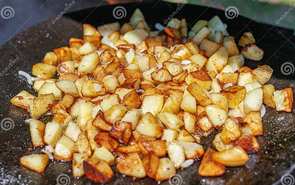 Fried Potatoes on a Fire or Grill. Stock Image - Image of outdoor, heat ...