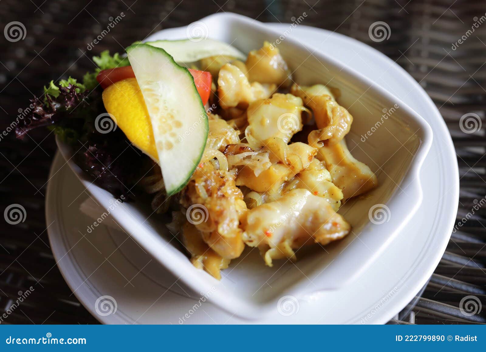 Fried Rapana Meat with Onions Stock Photo - Image of onion, lemon ...