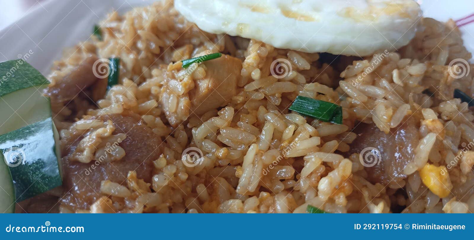 Fried Rice with Egg and Cucumber As the Garnish Stock Photo - Image of ...
