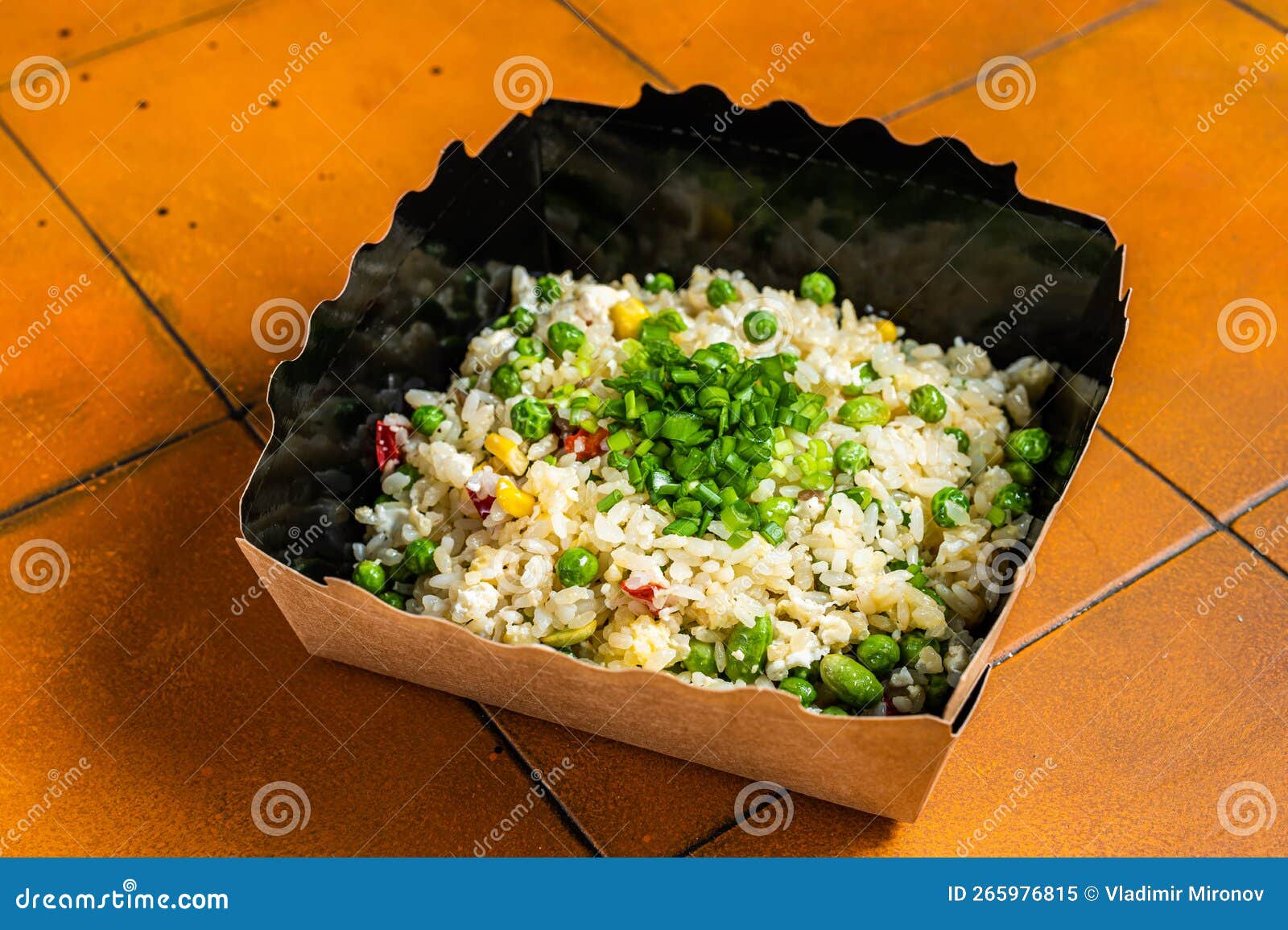Fried Rice with Egg and Vegetables in Box Take Away. Orange Background ...