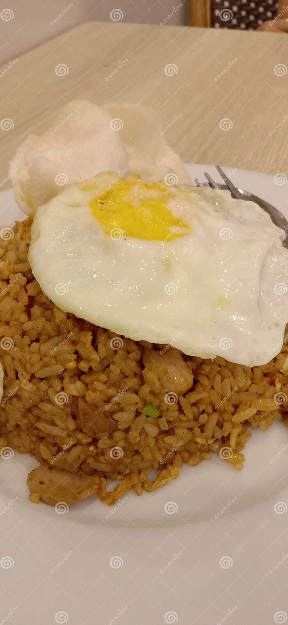 Fried Rice with Fried Egg on a White Plate is Ready To Eat Stock Image ...