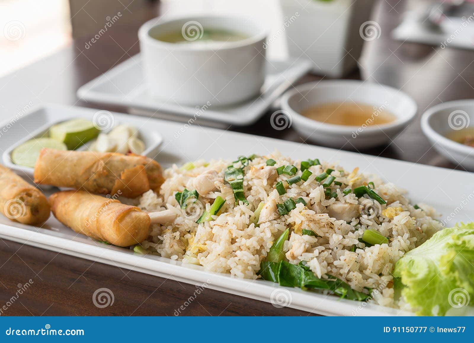Fried Rice with Salted Fish and Fried Spring Rolls. Stock Image - Image ...