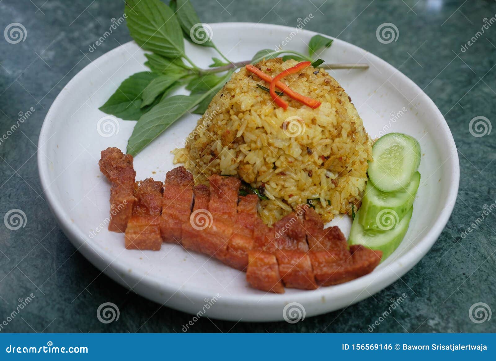 Fried Rice with Thai Herb and Crispy Pork Stock Photo - Image of pork ...