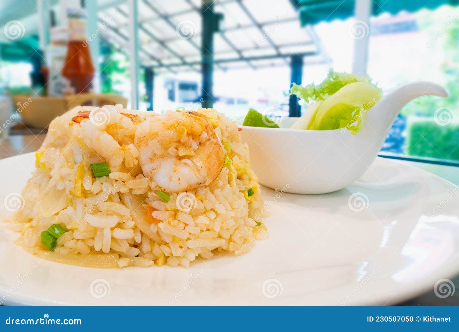 Fried rice on white plate stock photo. Image of dish - 230507050