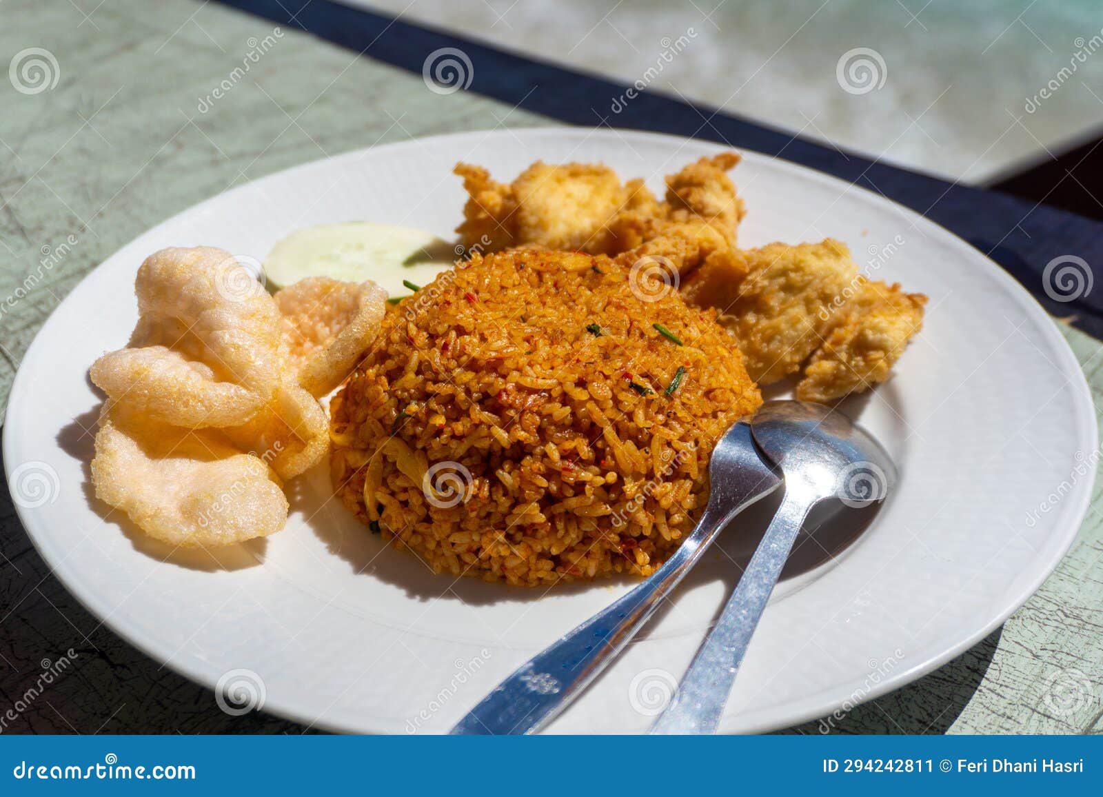 Fried Rice on White Plate. Delicious Fried Rice Served with Crispy ...