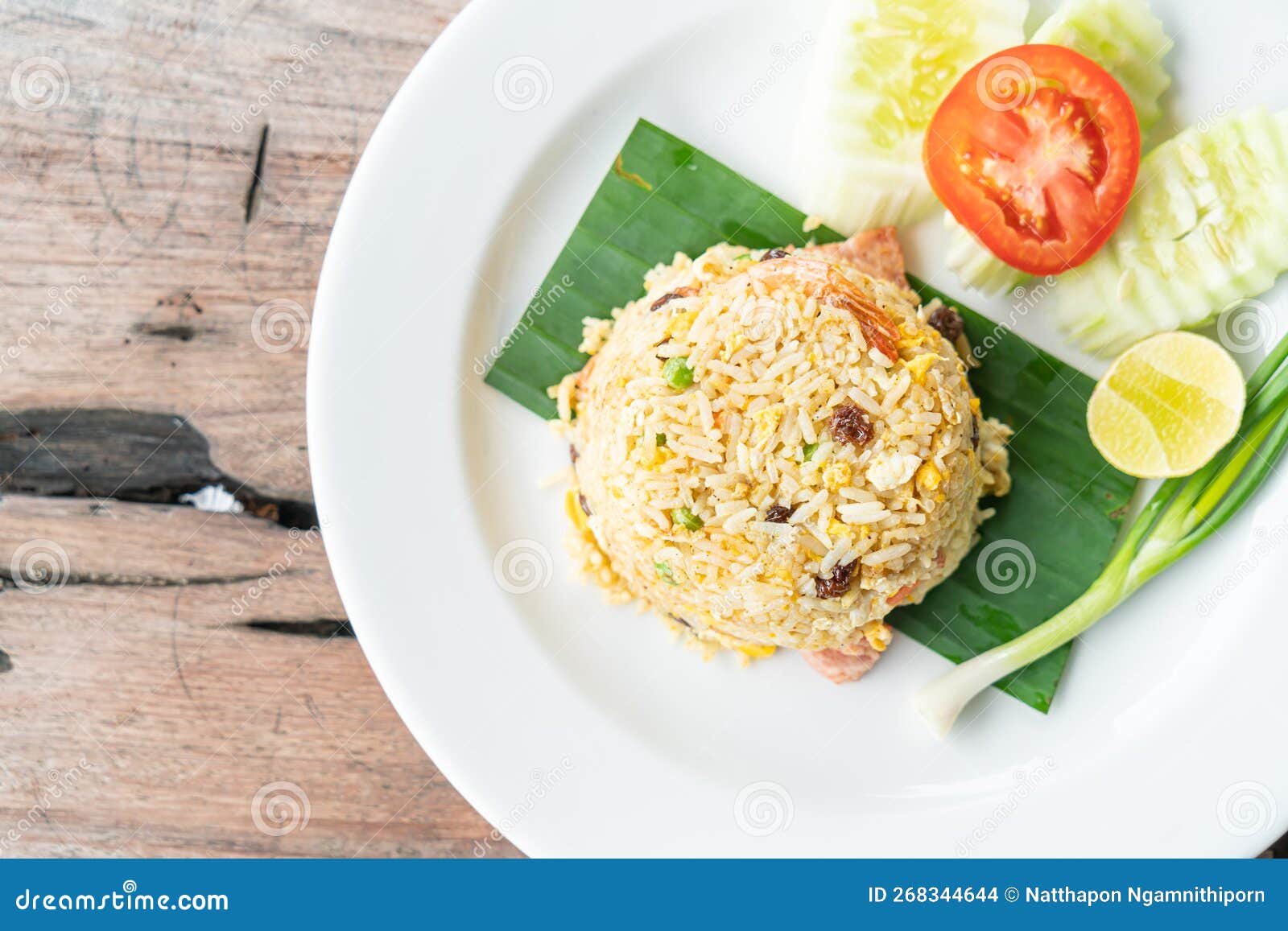 Fried rice on white plate stock photo. Image of carrots - 268344644